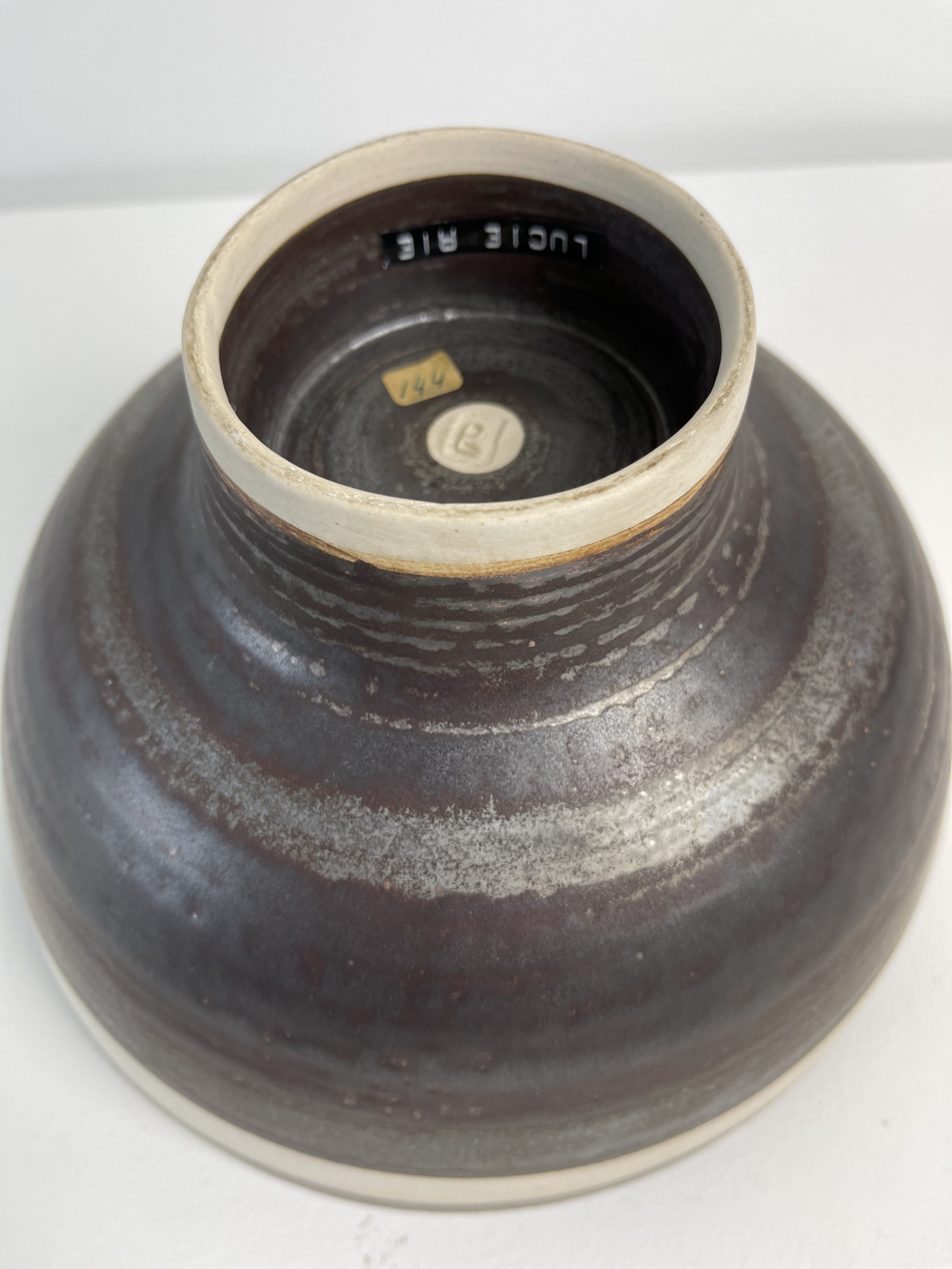 Lucie Rie, turned footed bowl, with stamped mark LR at the bottom ...