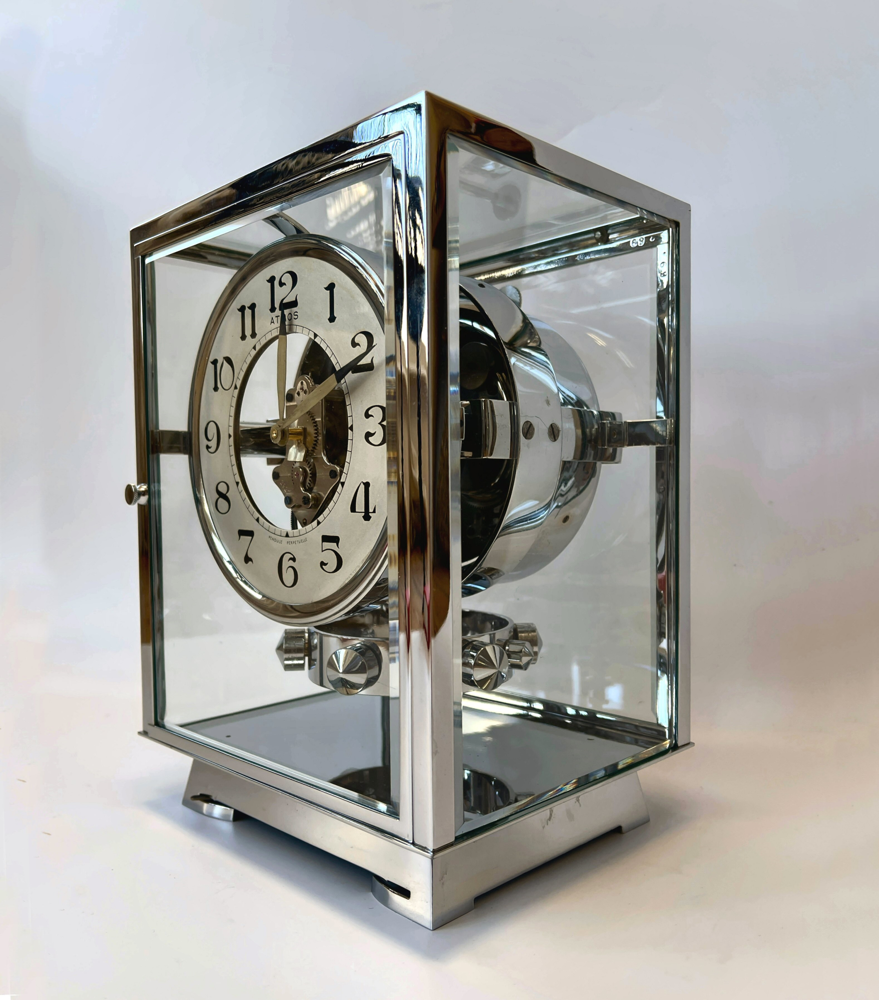 A fine model Atmos clock, chrome no 4335, by Jean Leon Reutter, circa ...