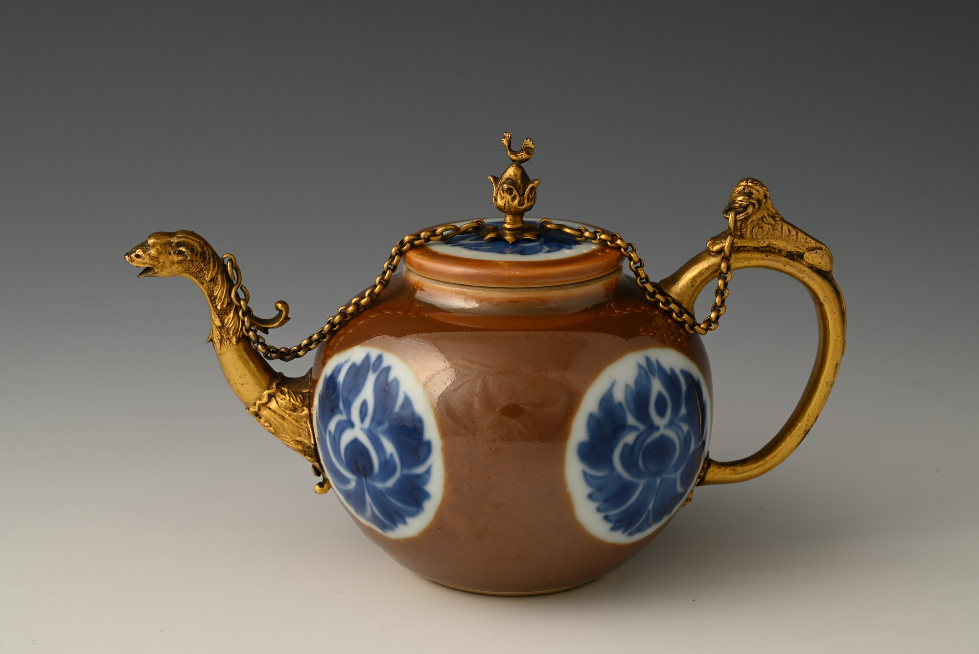 A Chinese Batavia brown teapot with gilded mounts | ArtListings