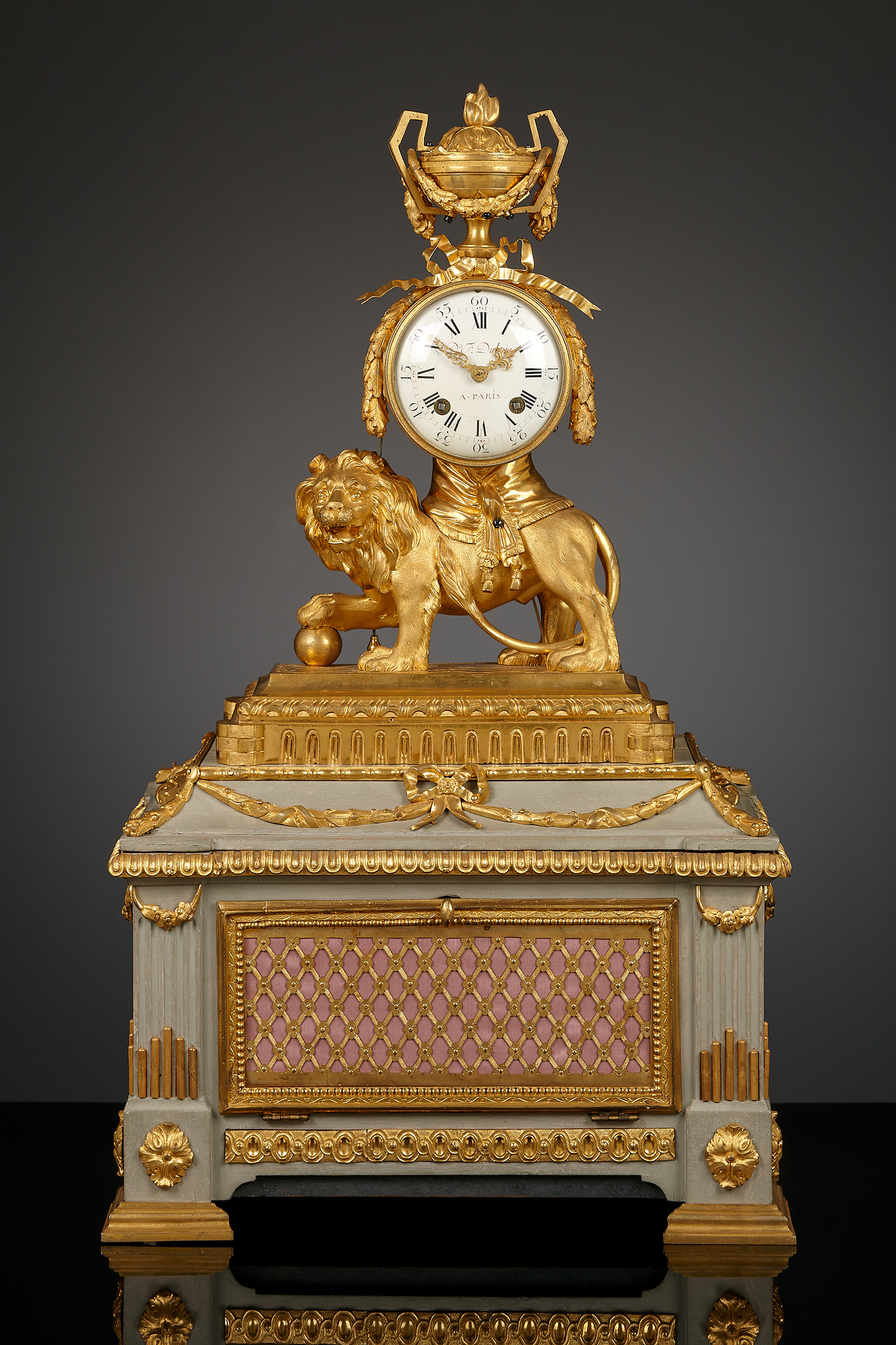 French Louis XVI lion mantel clock with musical box | ArtListings